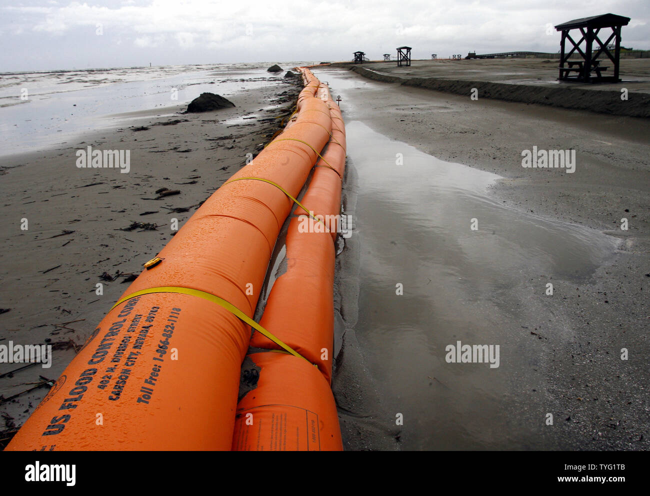 A tiger dam placed to keep oil off the beach is seen in Grand Isle ...