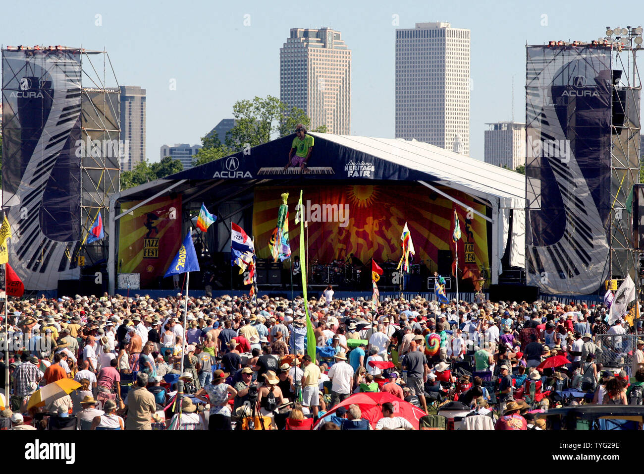 Thousands of music lovers jam the Fair Grounds for the New Orleans Jazz ...