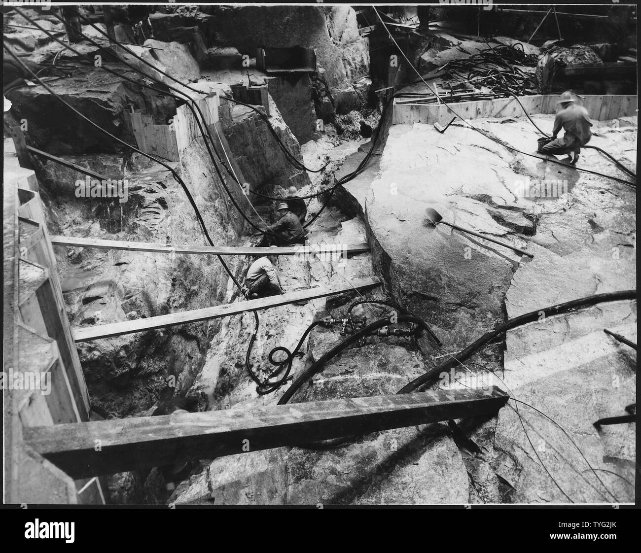 Preparing block 40-J for concrete.; Scope and content: Photograph from ...