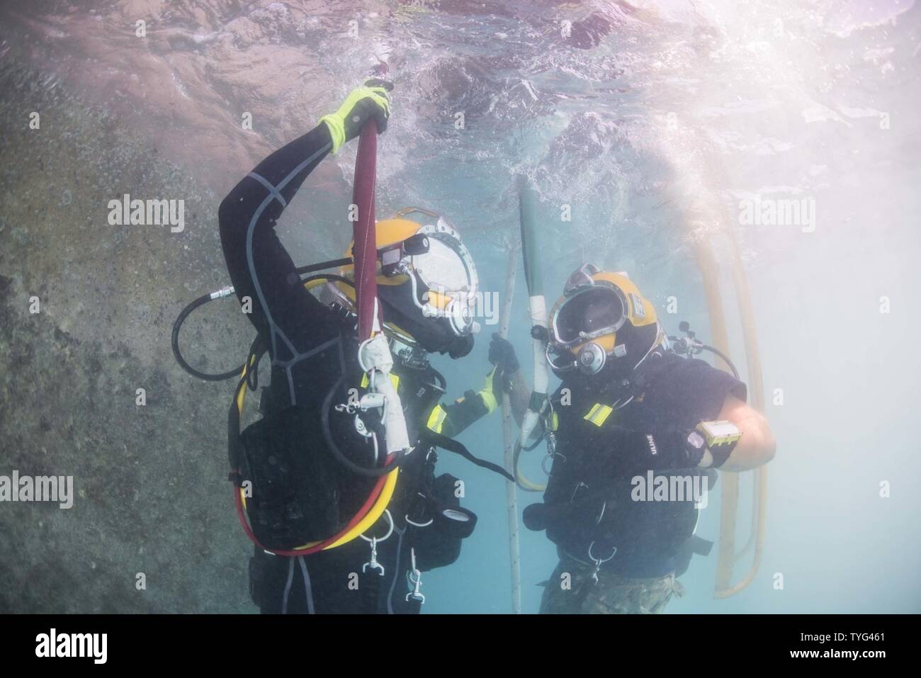 Chief Petty Officer Jesse Hamblin, left, and Petty Officer 2nd Class ...