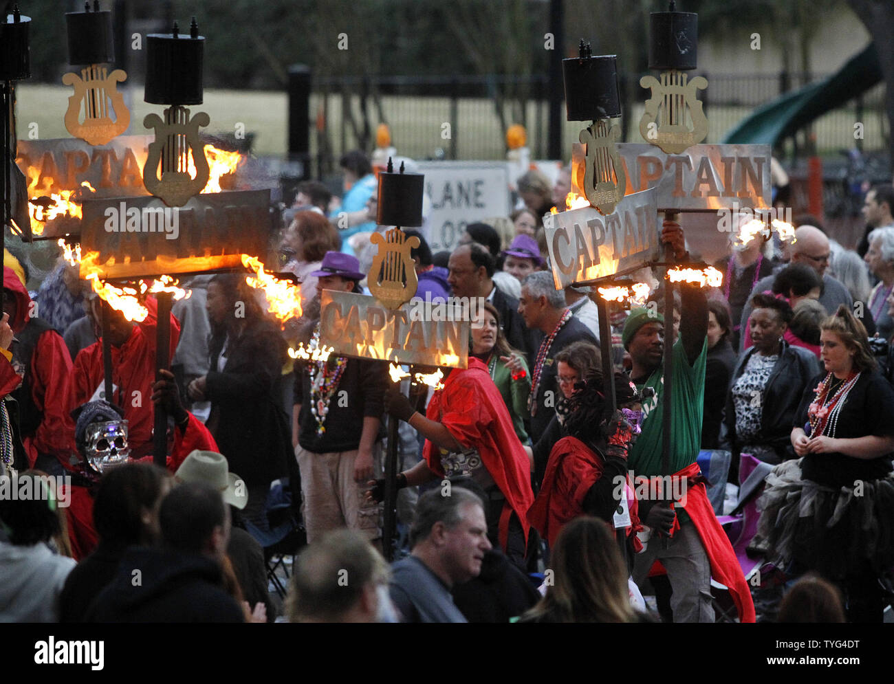 Flambeaux carriers lead the way for the Krewe of Orpheus as it Parades ...