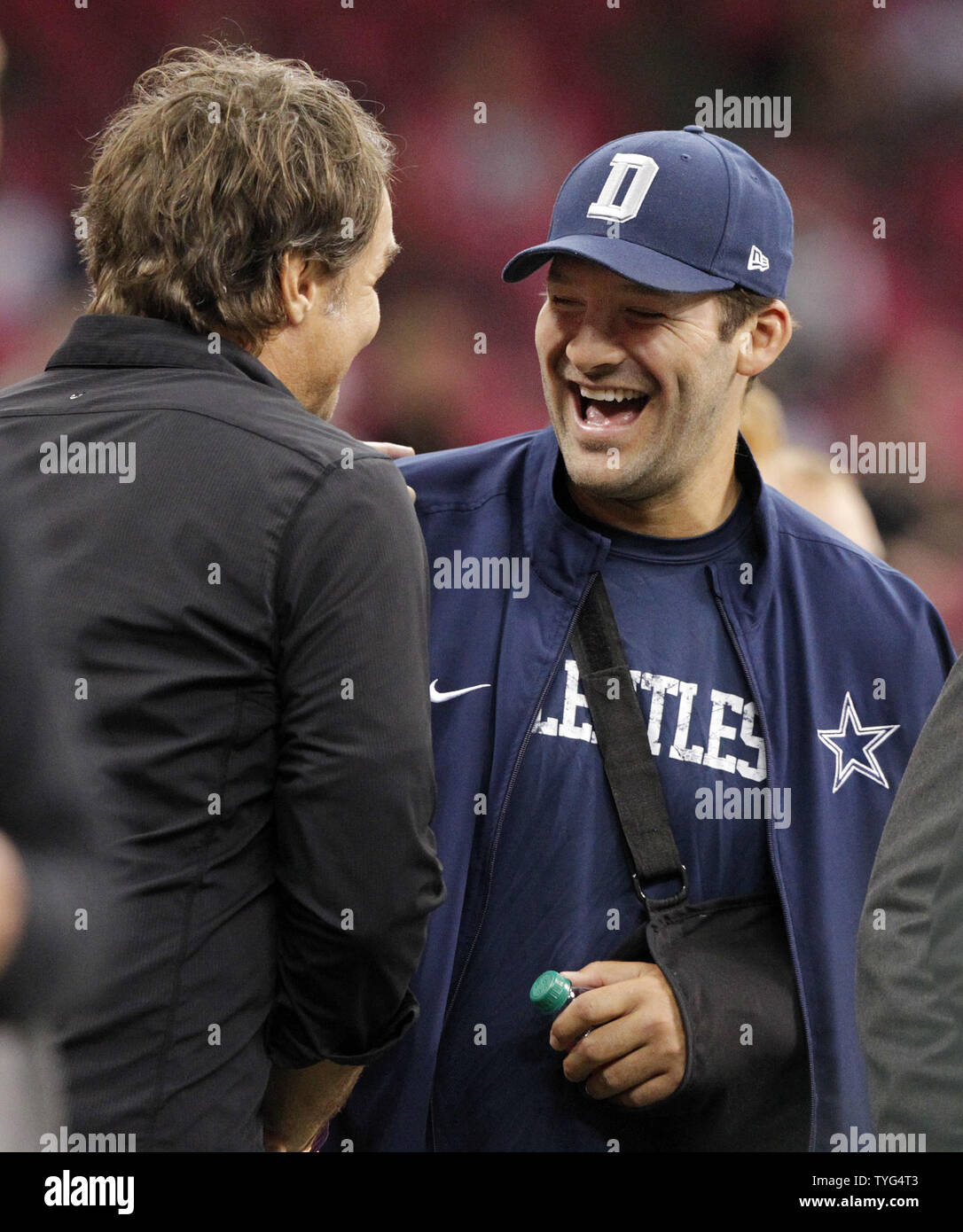 Dallas Cowboys quarterback Tony Romo talks with fans before the game ...