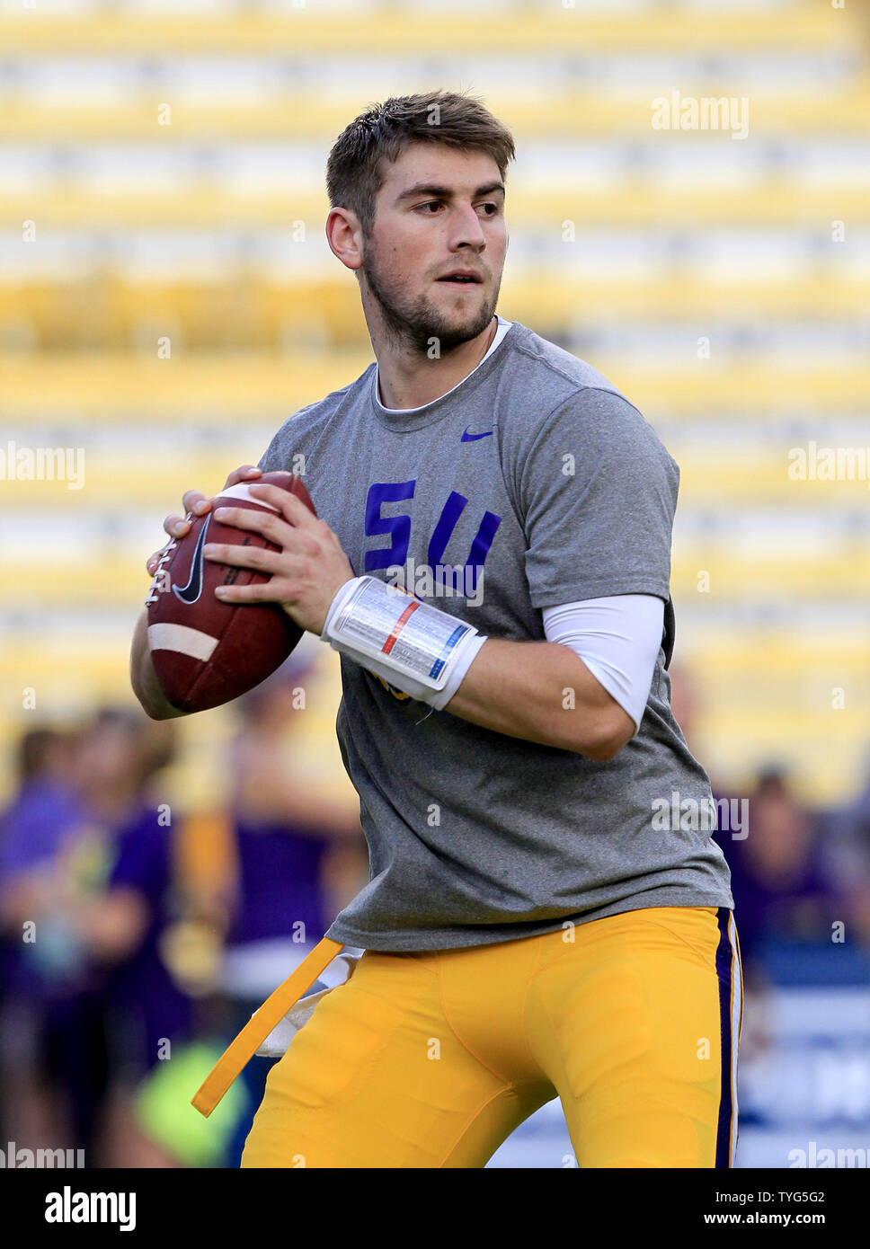 LSU Tigers quarterback Danny Etling (16) warms up before the game with ...