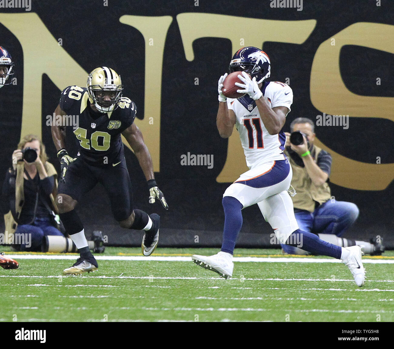 Denver Broncos wide receiver Jordan Norwood (11) takes a Trevor Siemian ...