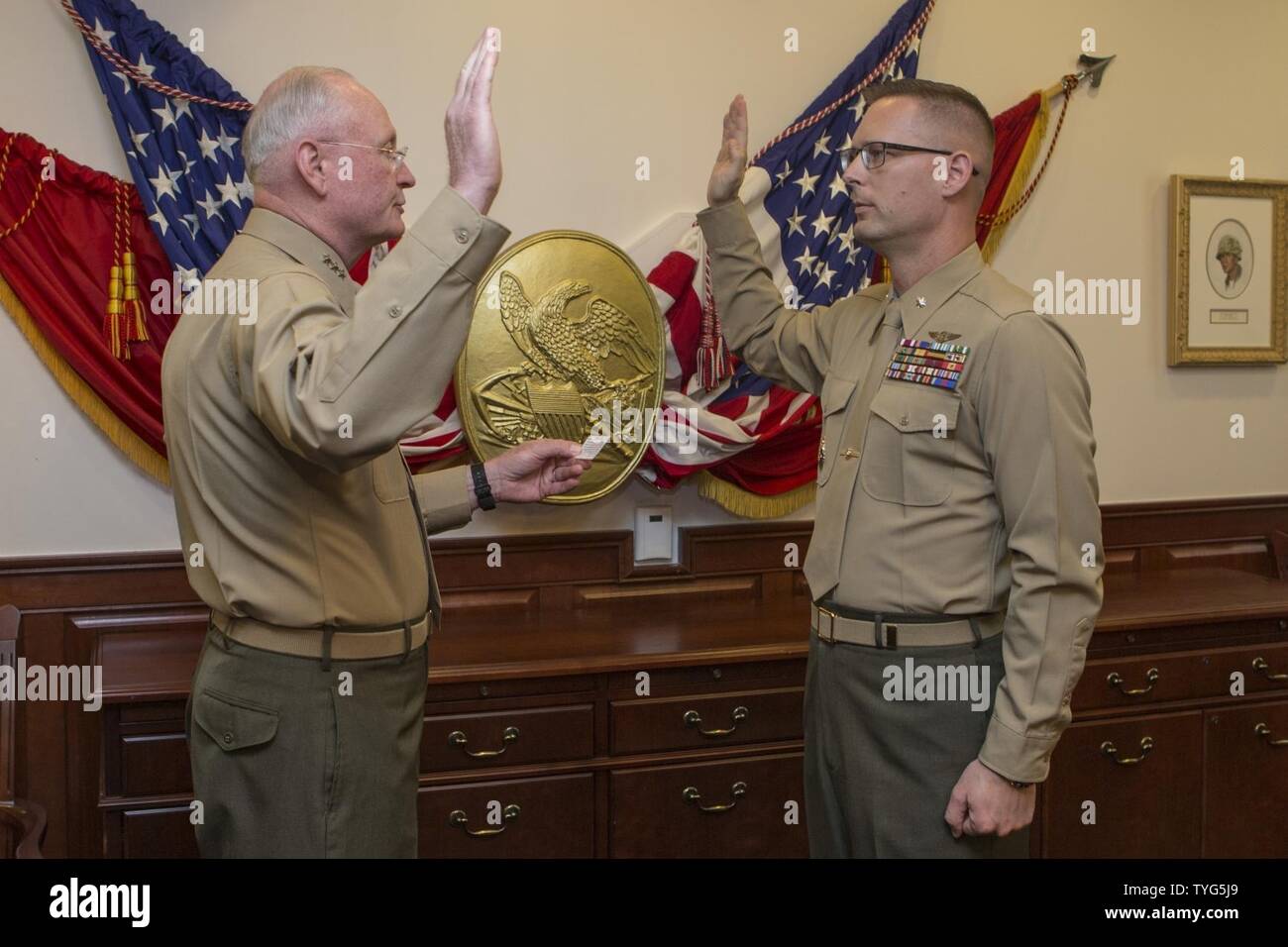 Director of Marine Corps Staff, Lt. Gen. James B. Laster, administers ...
