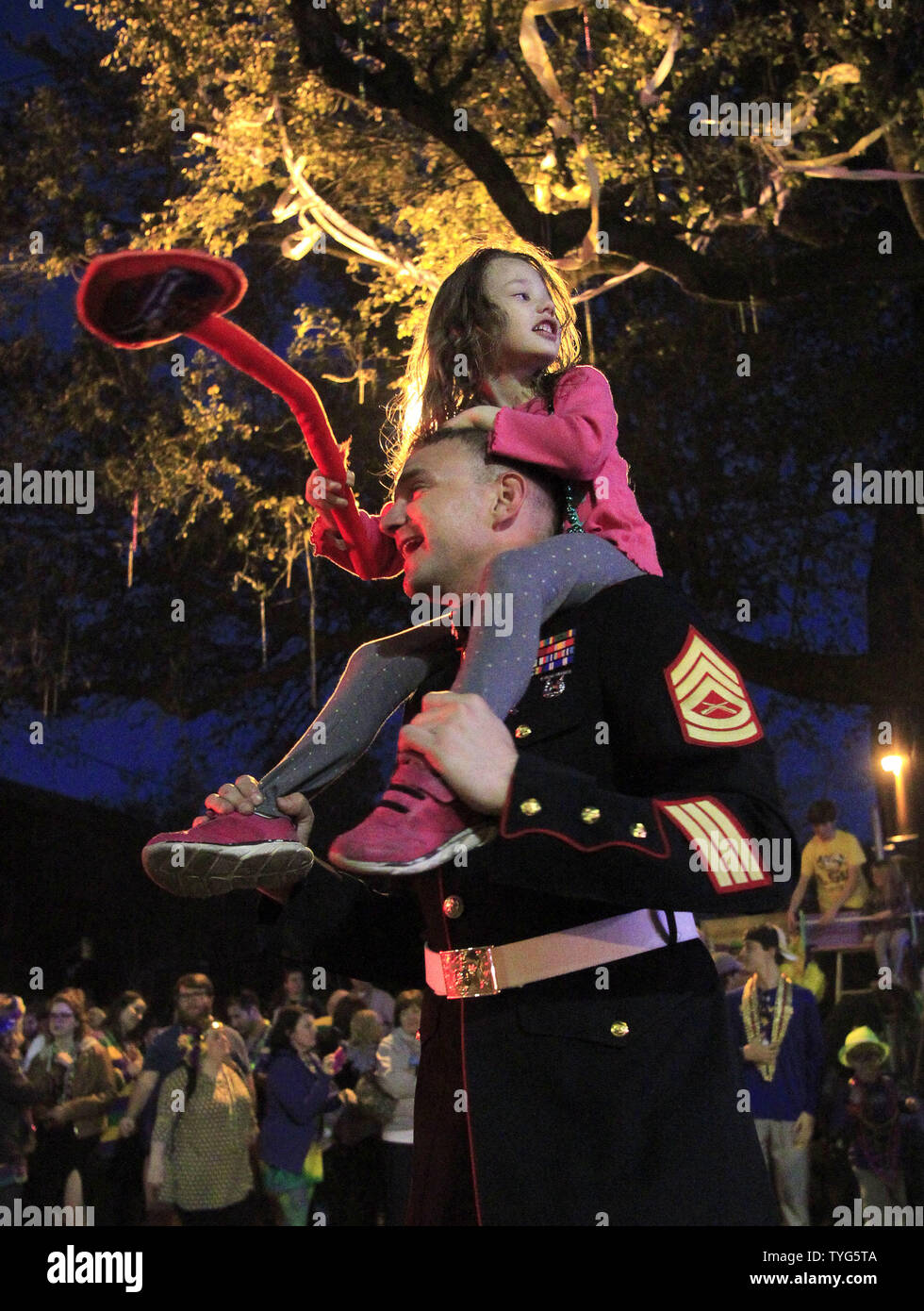 U.S. Marine Corps Gunnery Sgt. Christopher Broadstreet holds Audrey ...