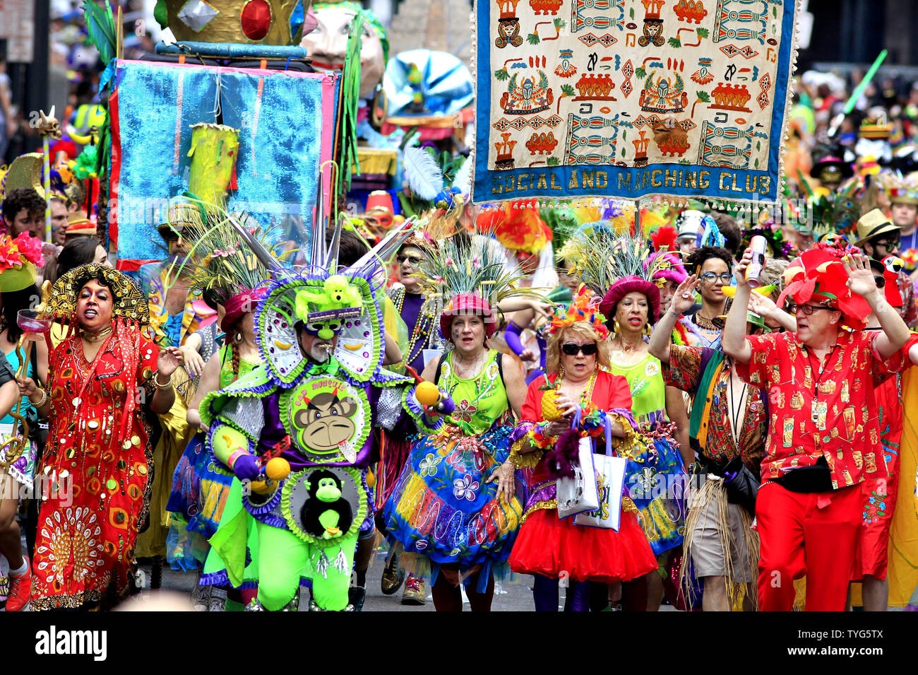 Members of the marching group Mondo Kayo parade down St Charles Avenue ...