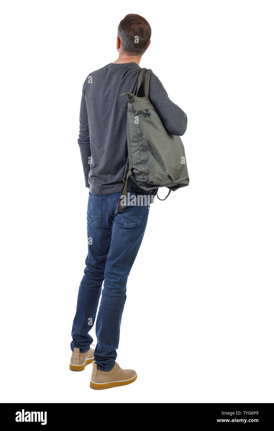 Back view of a man with a green bag. backside view of person. A young ...