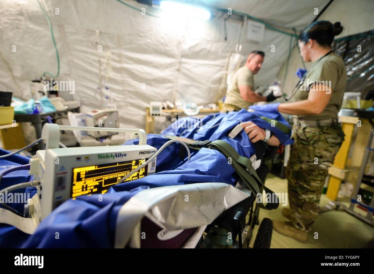U.S. Army Capt. Teri Dorn, right, 28th Combat Support Hospital trauma ...