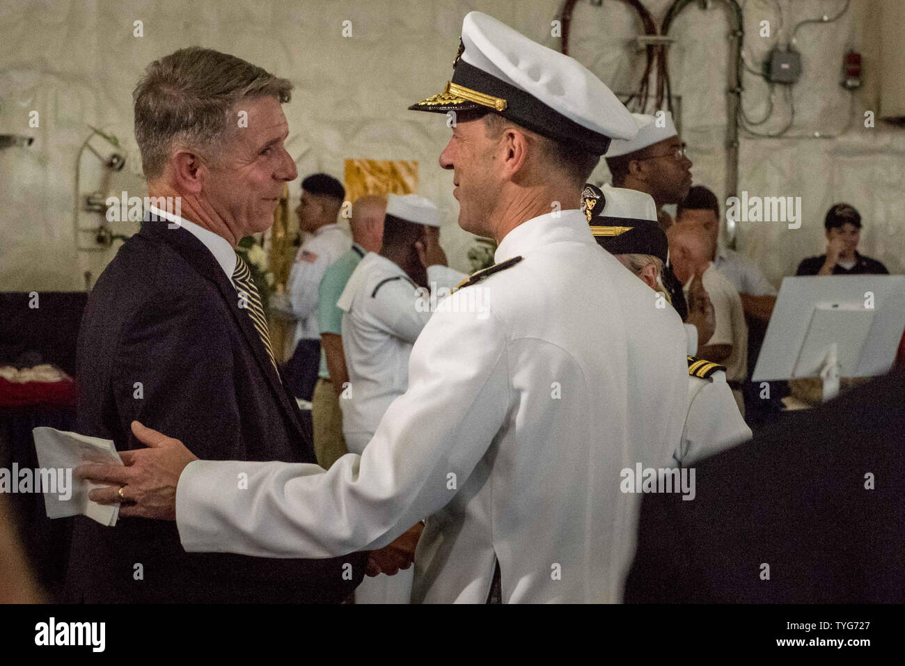 Chief of Naval Operations Admiral John Richardson, USN, right, speaks ...