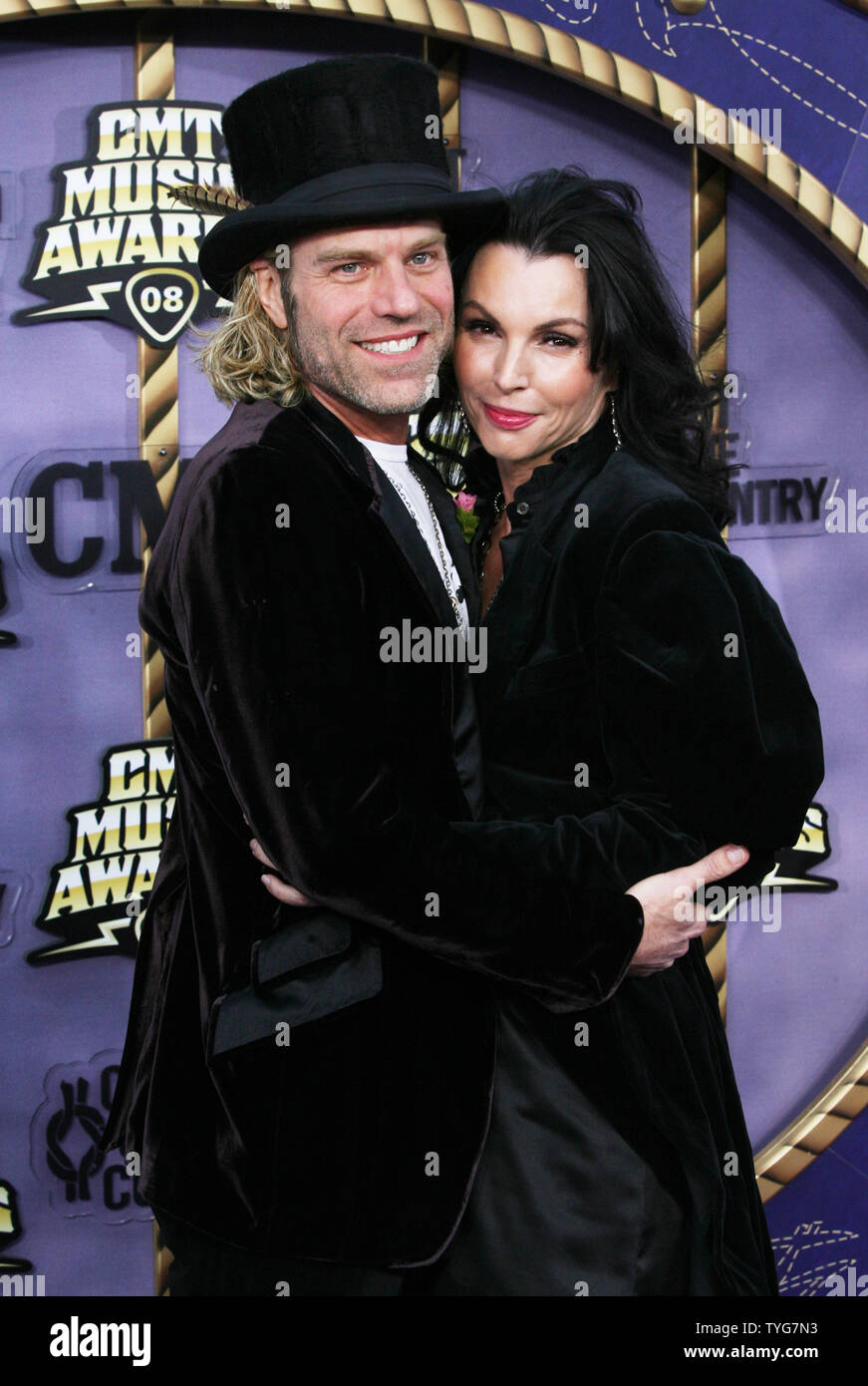 Big Kenny Alphin (L) and his wife Christiev arrive for the 2008 CMT ...