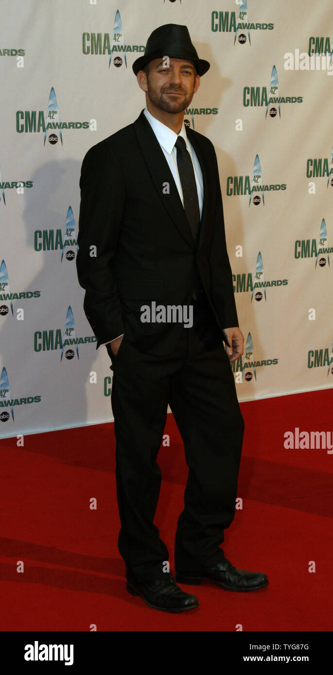 Kristian Bush, of band Sugarland, arrives on the red carpet at the 42nd annual Country Music ...