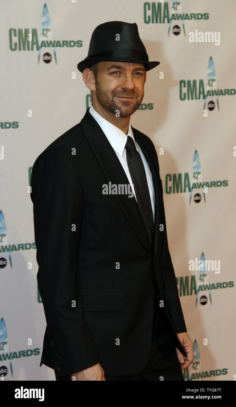 Kristian Bush, of band Sugarland, arrives on the red carpet at the 42nd annual Country Music ...