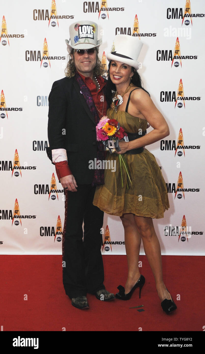 Big Kenny and his wife Christiev Alphin arrive on the red carpet of the 43rd Annual Country ...