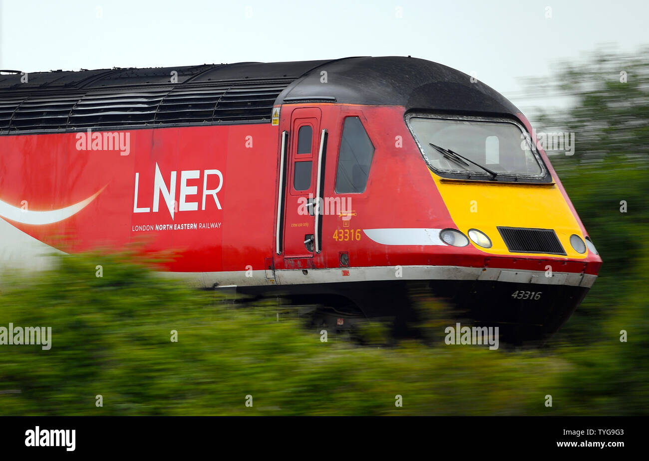A London North Eastern Railway (LNER) train passes through Sandy in ...