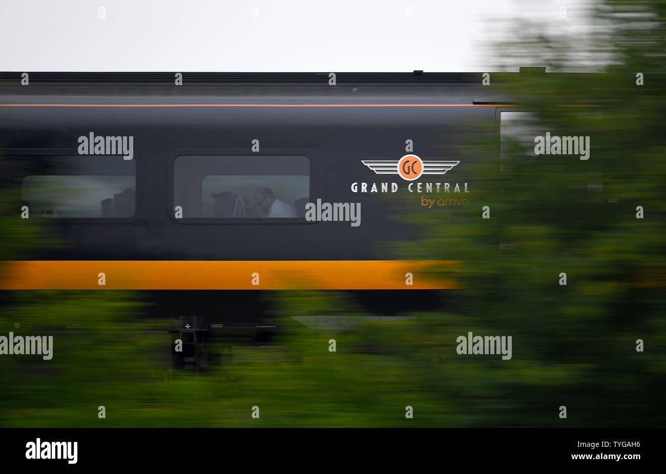 A Grand Central train passes through Sandy in Cambridgeshire Stock ...