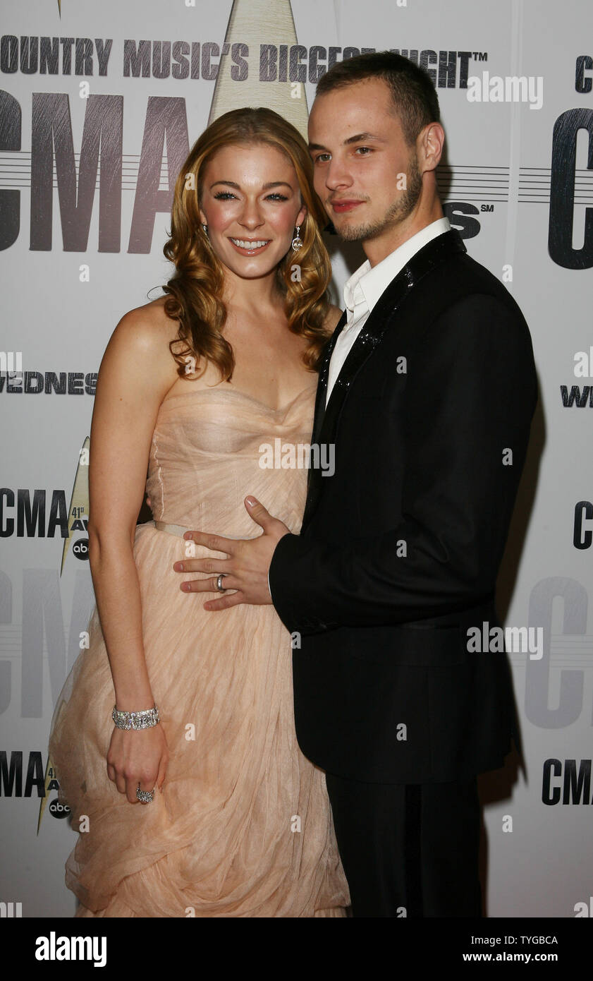 LeAnn Rimes and her husband Dean Sheremet arrive at the 41st annual Country Music Association ...