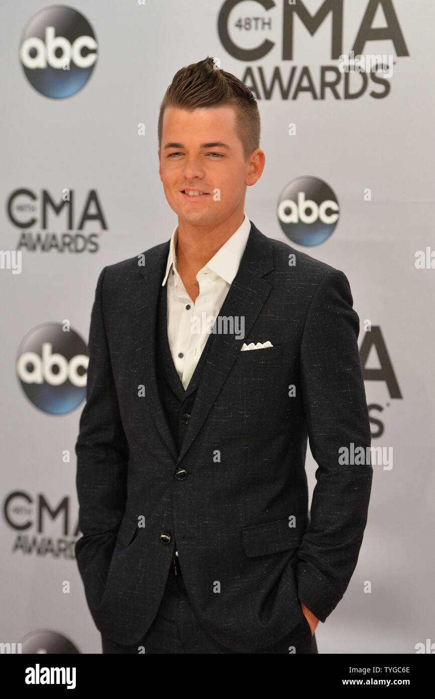 Chase Bryant arrives on the red carpet for the 48th Annual Country ...