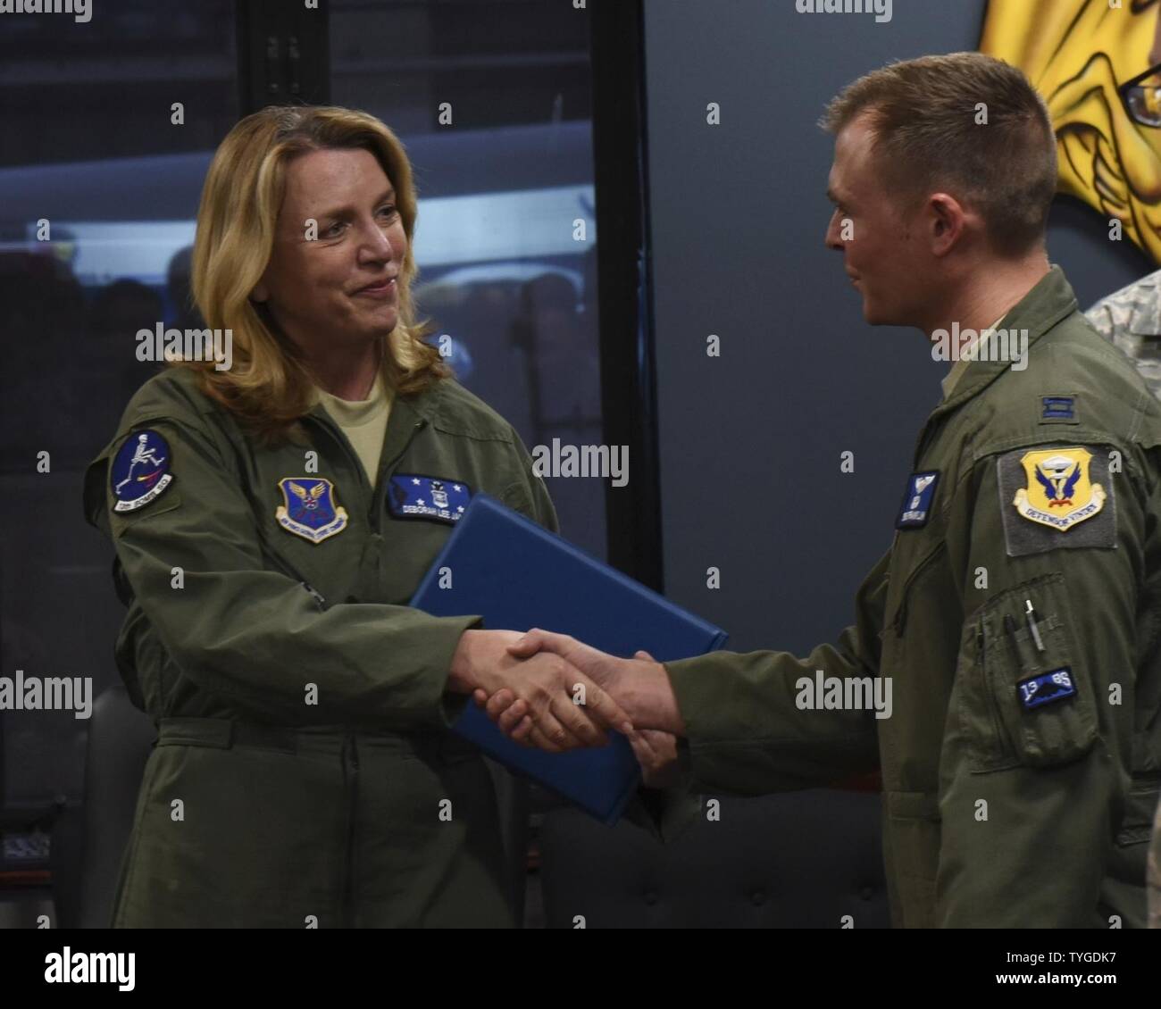 Secretary of the Air Force Deborah Lee James shakes, left, hands with U ...