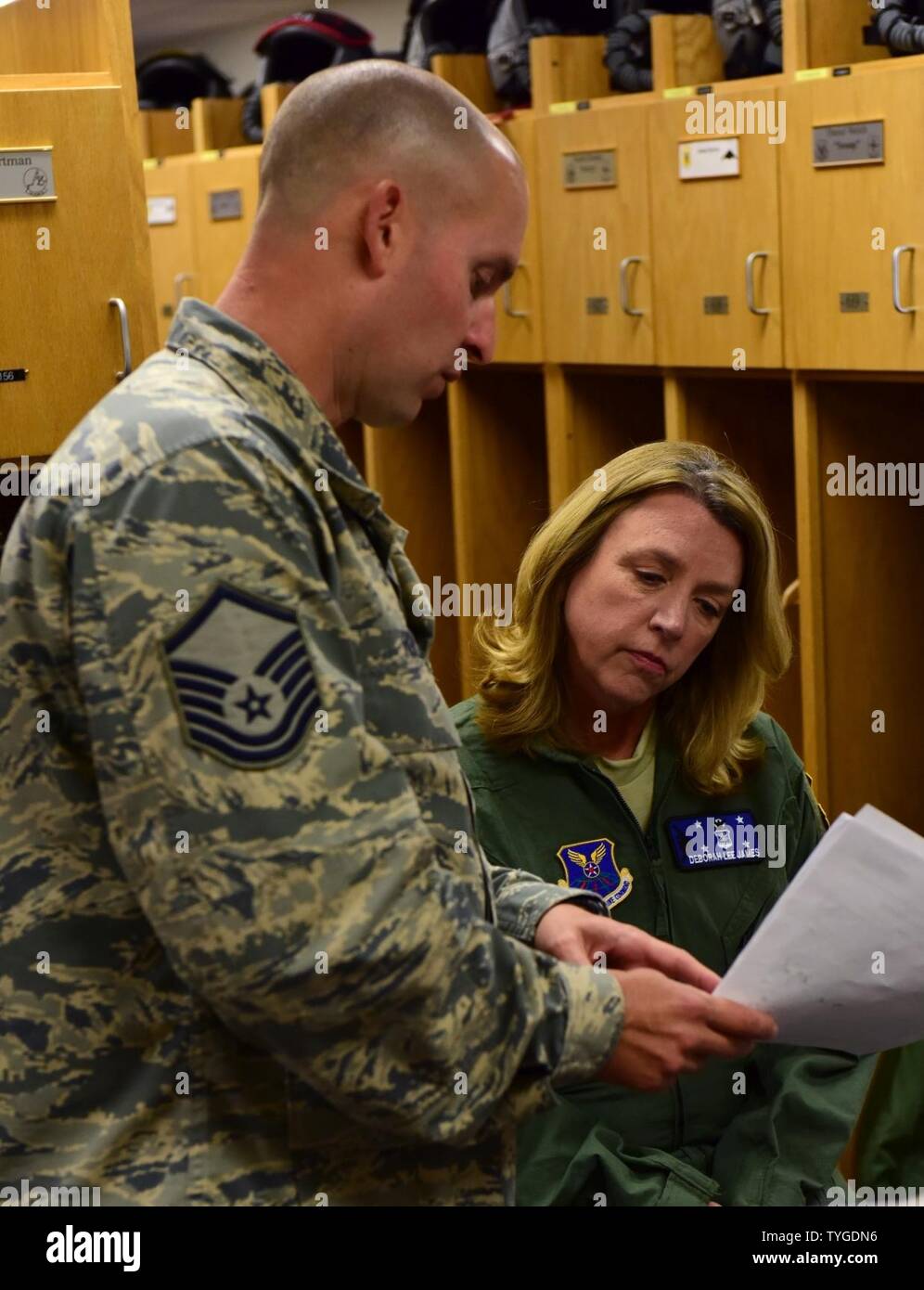 U.S. Air Force Master Sgt. Michael Roll, left, 509th Operations Support ...