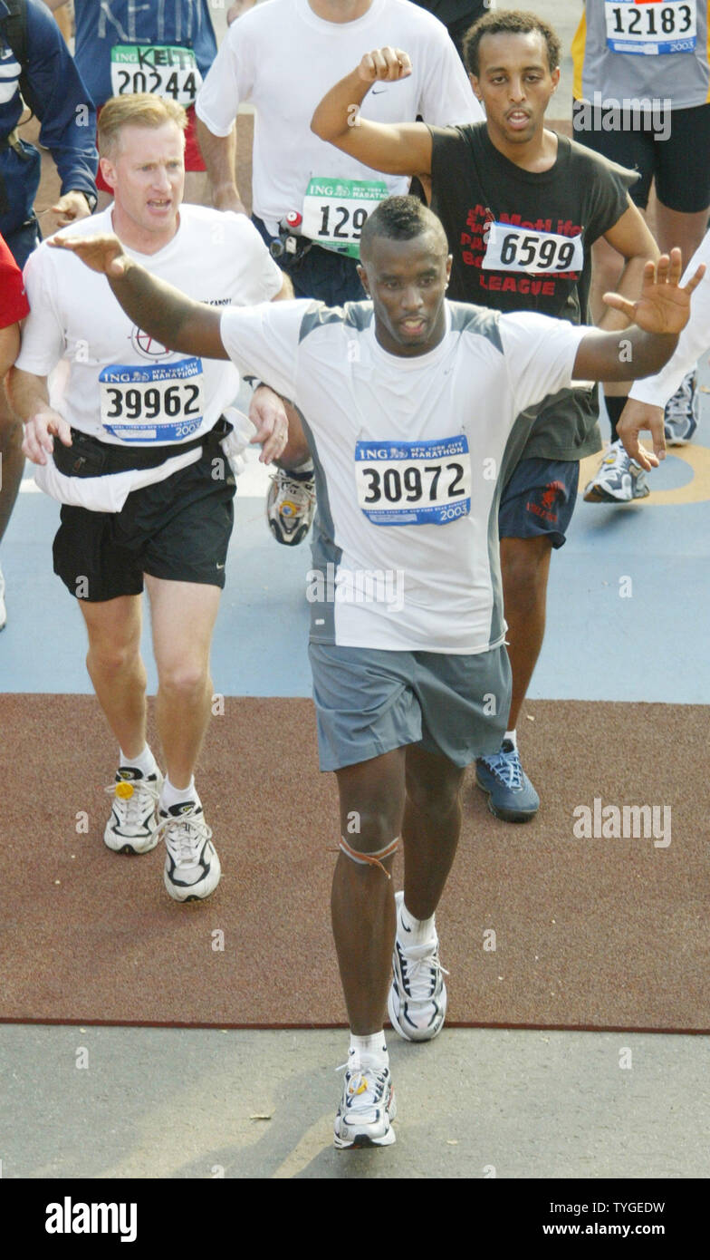 Sean "P.Diddy" Combs crosses the finish line as he runs his first New ...