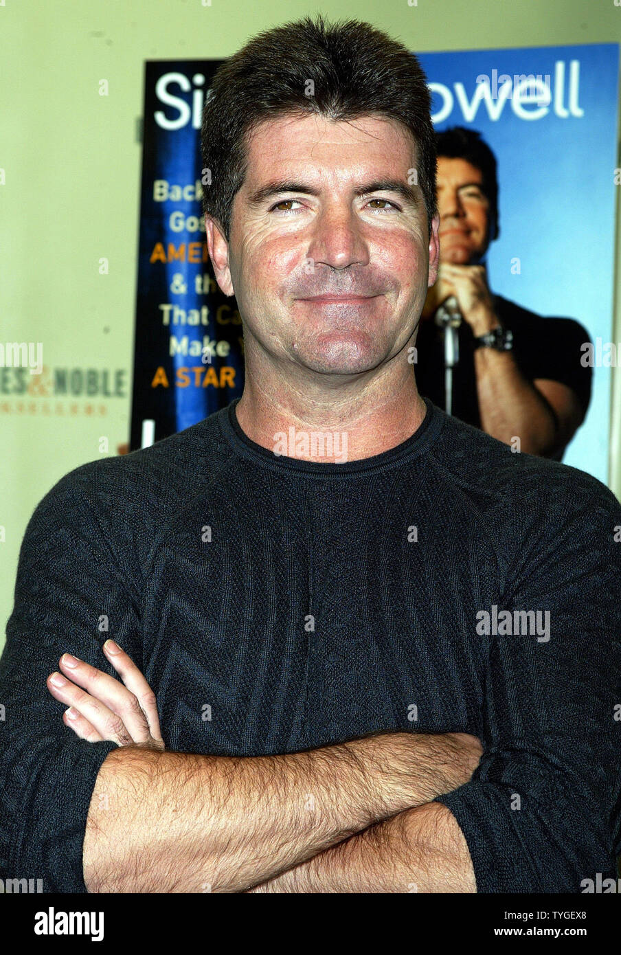 Simon Cowell signs copies of his new book "I Don't Mean to Be Rude, But ...