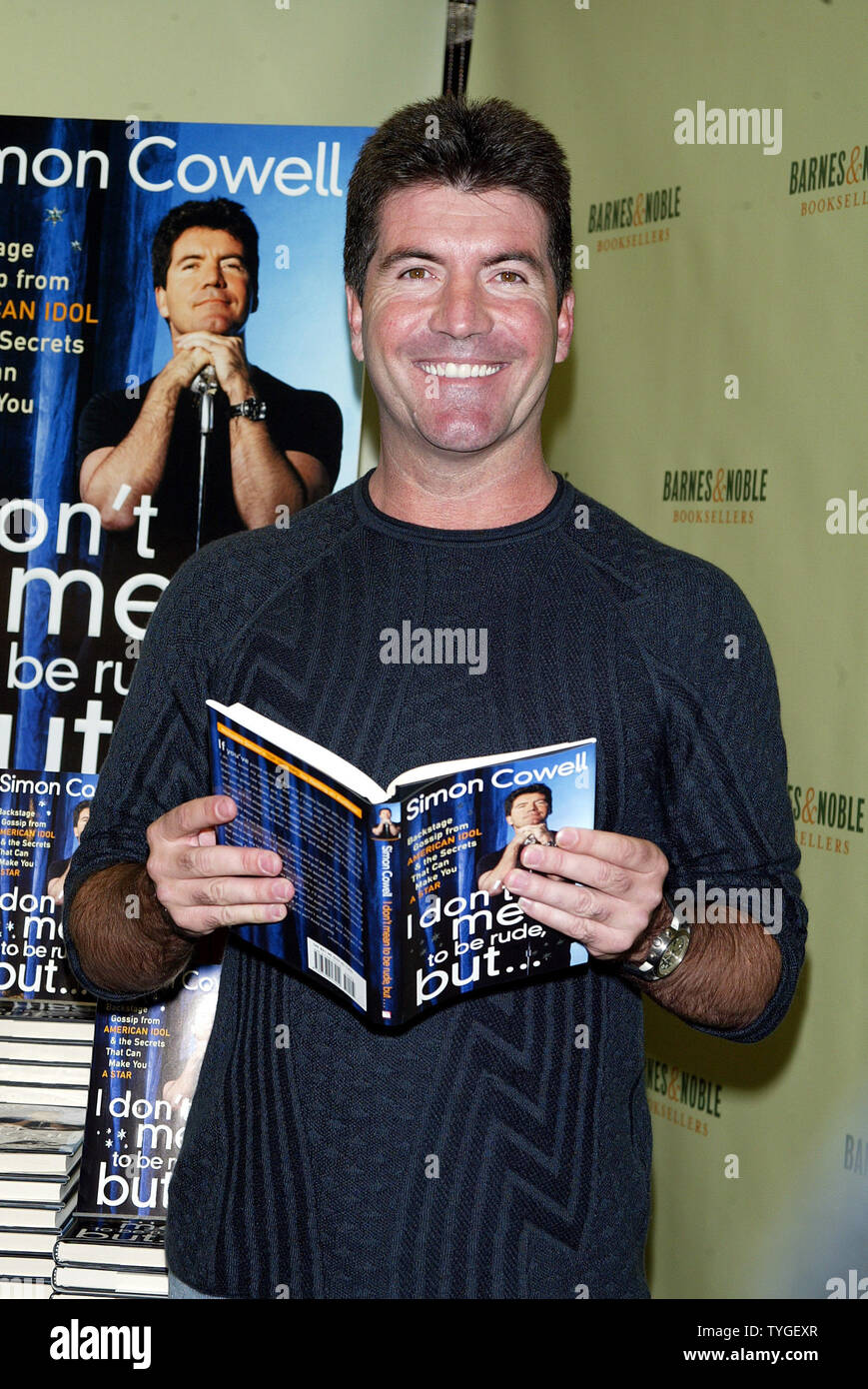 Simon Cowell signs copies of his new book "I Don't Mean to Be Rude, But ...