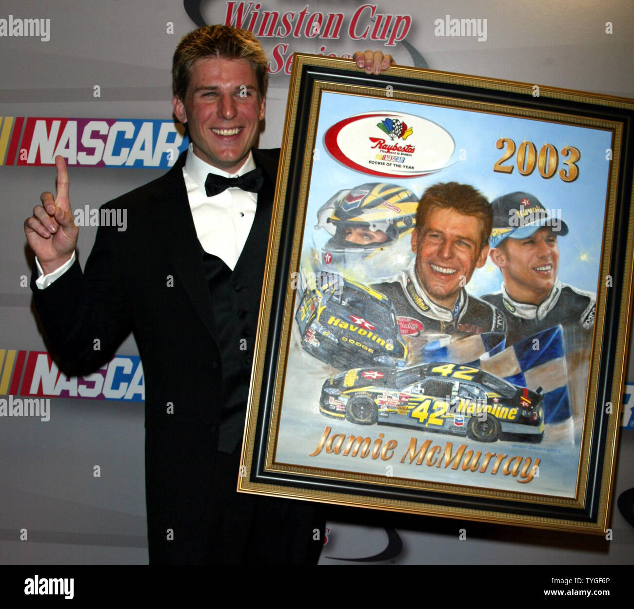 Jamie McMurray poses for pictures at the 2003 NASCAR Winston Cup Series ...