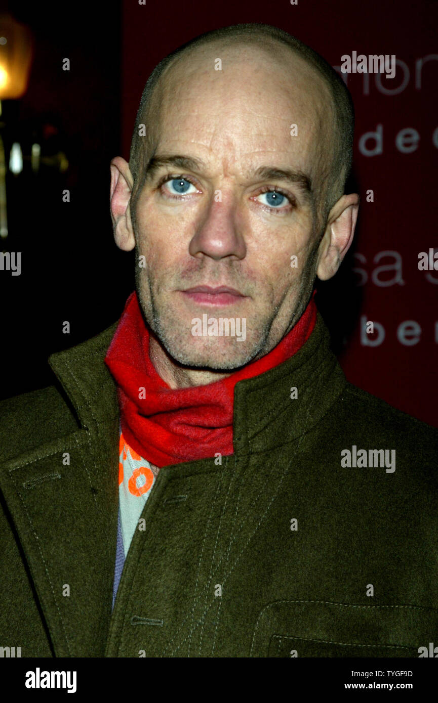 Michael Stipe poses for pictures at the premiere of "Mona Lisa Smile ...