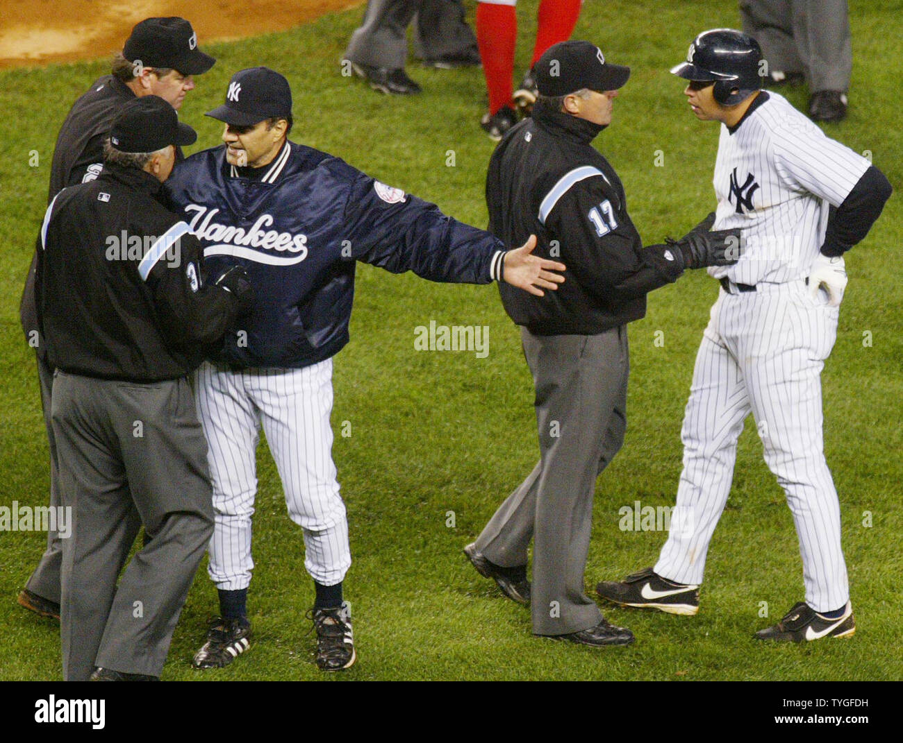 New York Yankee's manager Joe Torre, third left, and Alex Rodriguez ...