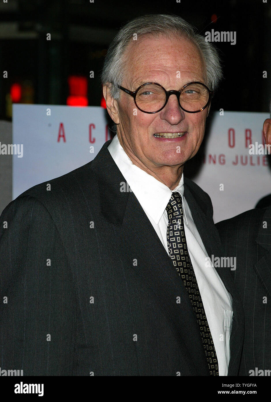Alan Alda poses for pictures at the Premiere of Court TV's "Chasing ...