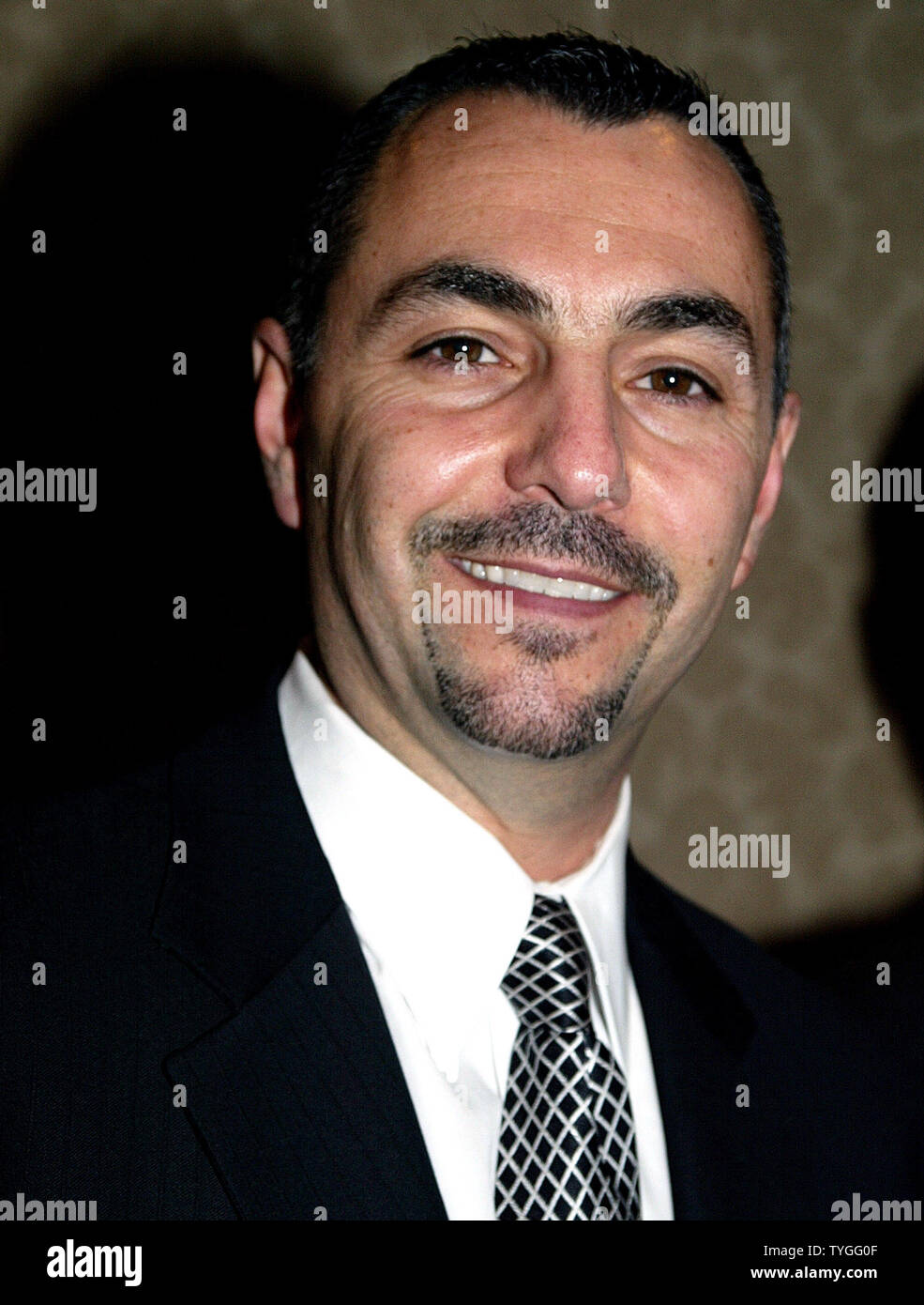 John Franco poses for pictures at a press conference prior to being ...