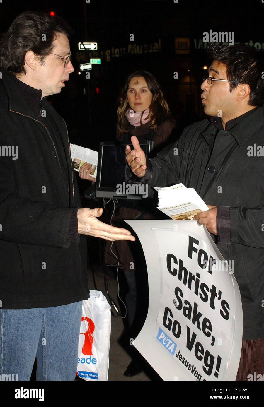 Members of PETA bring their animal rights protest on Feb. 25, 2004 to a ...