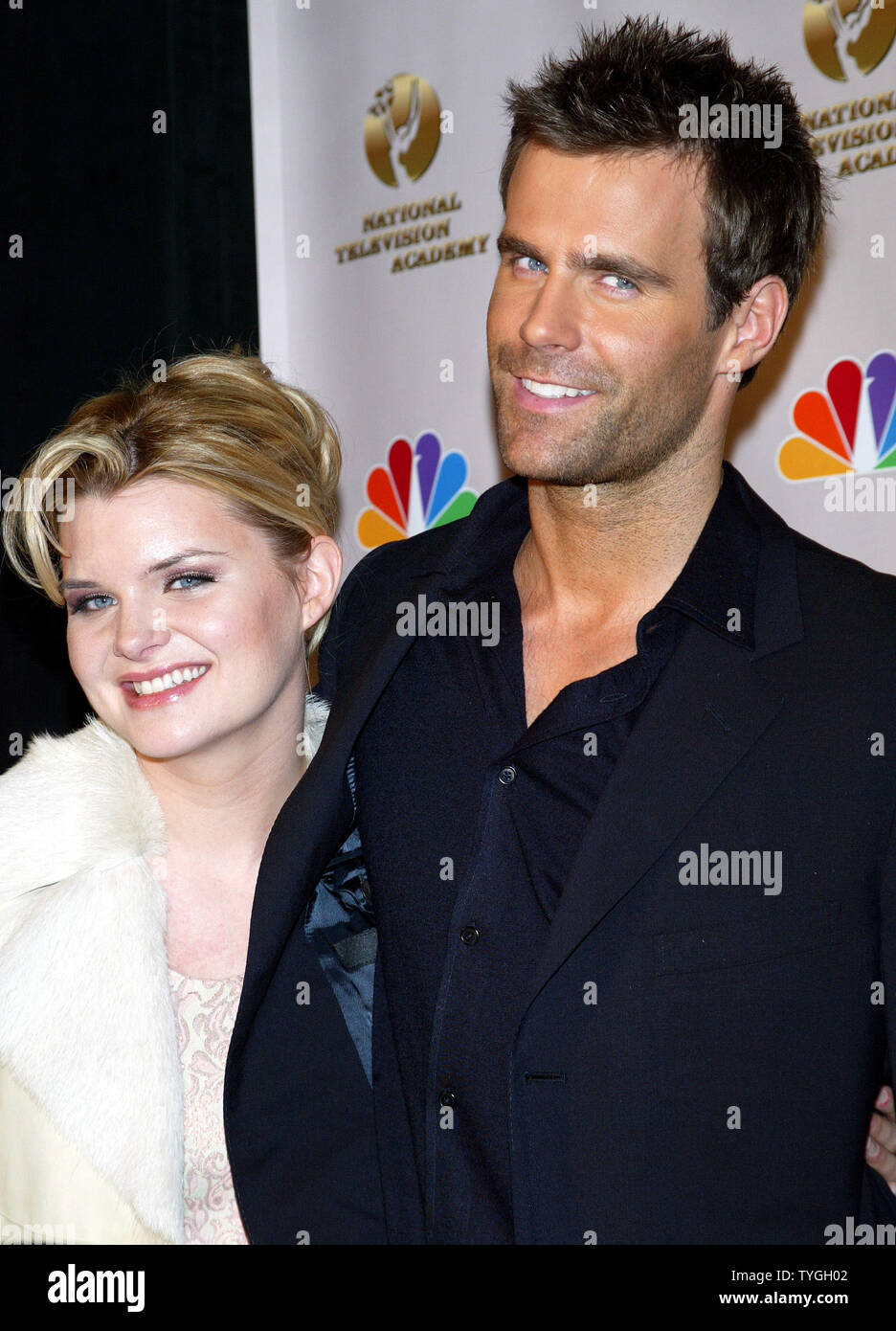 Heather Tom and Cameron Mathison pose for pictures after announcing the ...