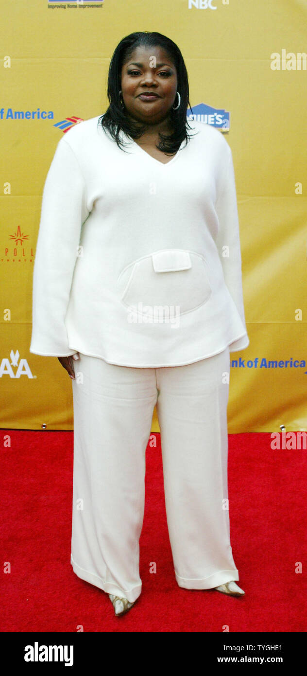 Mo'Nique poses for photographers at the Apollo Theater 75th Anniversary ...