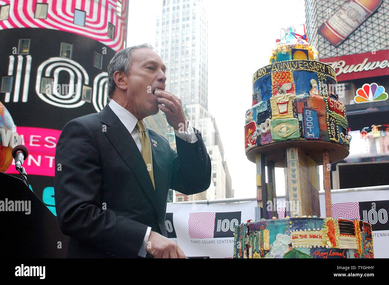 New York City's Mayor Michael Bloomberg licks his fingers on April 7 ...