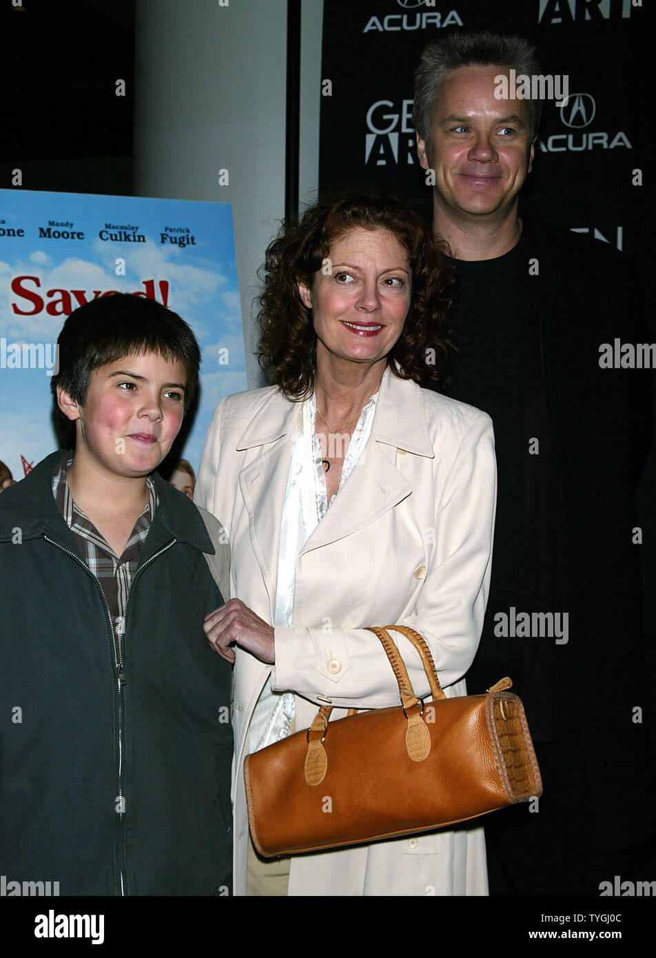 Susan Sarandon, Tim Robbins and their son Miles pose for pictures at ...