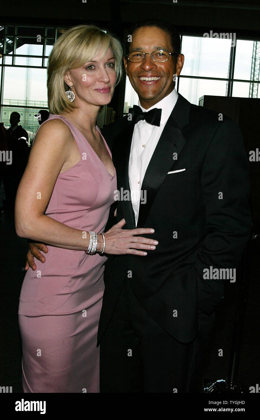 Bryant Gumbel and wife pose for pictures at the 10th Annual Arthur Ashe ...
