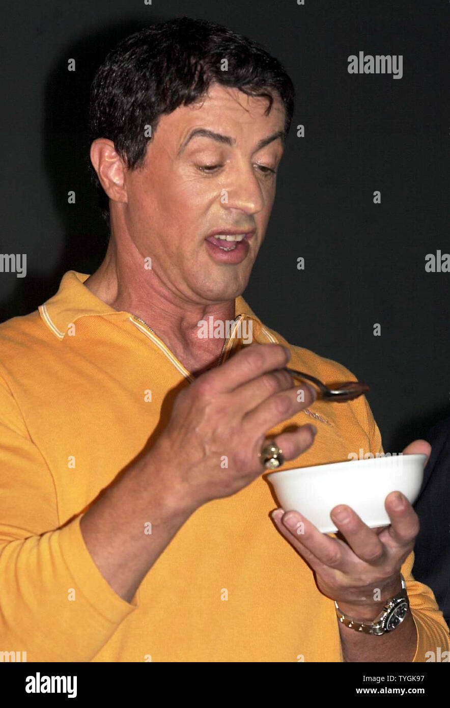 Actor Sylvester Stallone samples his product at the May 19, 2004 launch ...