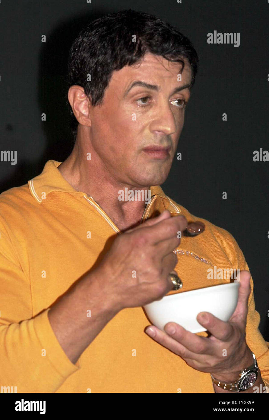 Actor Sylvester Stallone samples his product at the May 19, 2004 launch ...