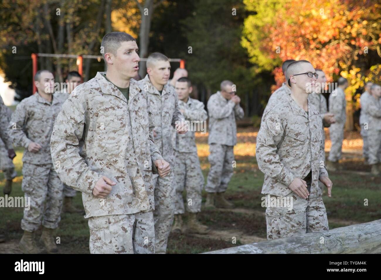 U.S. Marine candidates with Officer Candidate School (OCS), warm up ...