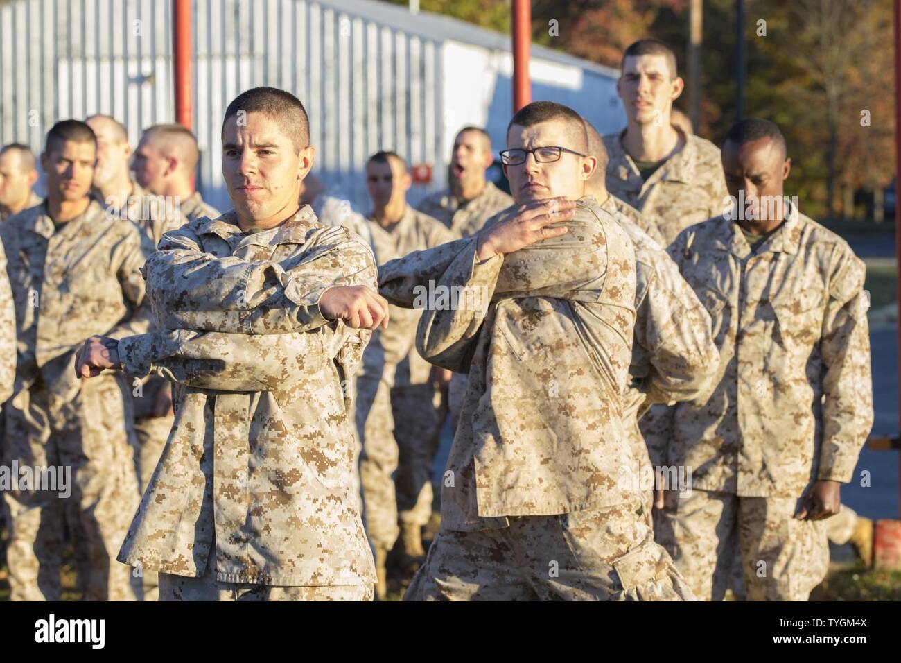 U.S. Marine candidates with Officer Candidate School (OCS) stretch ...