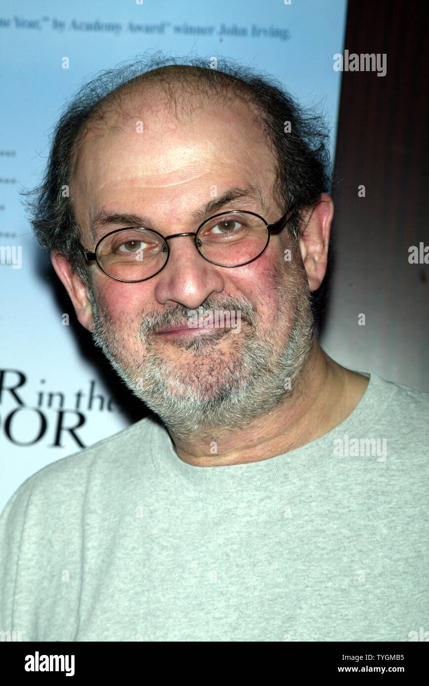 Salman Rushdie poses for pictures at the Screening of "The Door in the ...