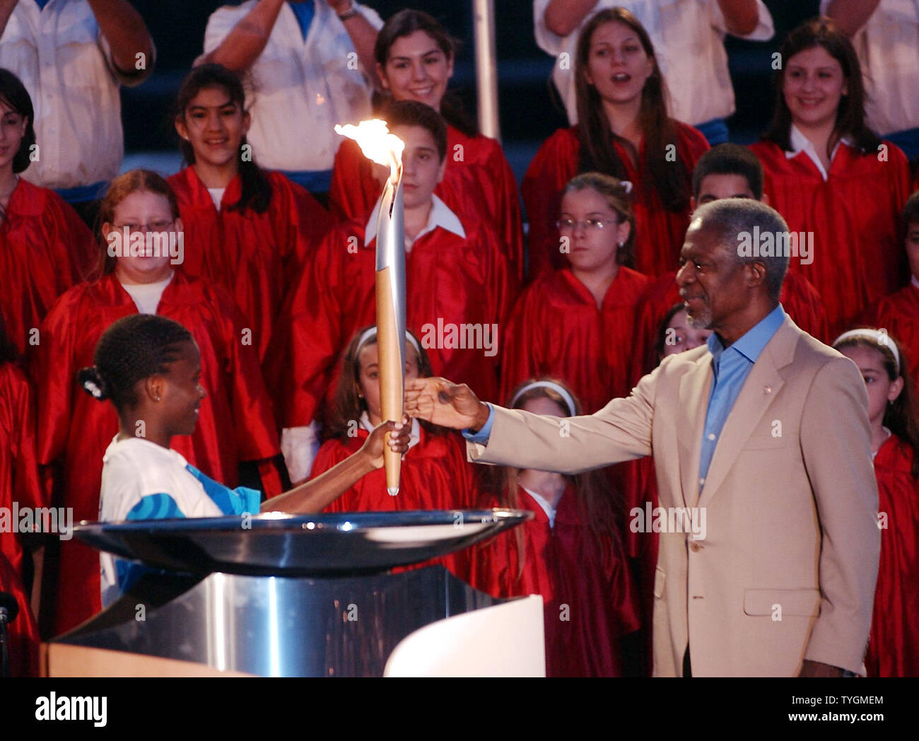 Torchbearer Toni Jones formely of Liberia now living in New York hands ...