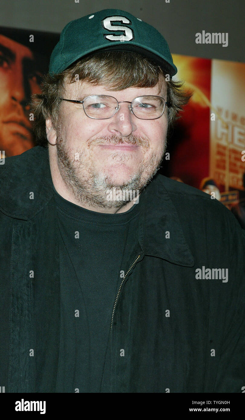 Michael Moore poses for pictures at the New York Premiere of HBO's new ...
