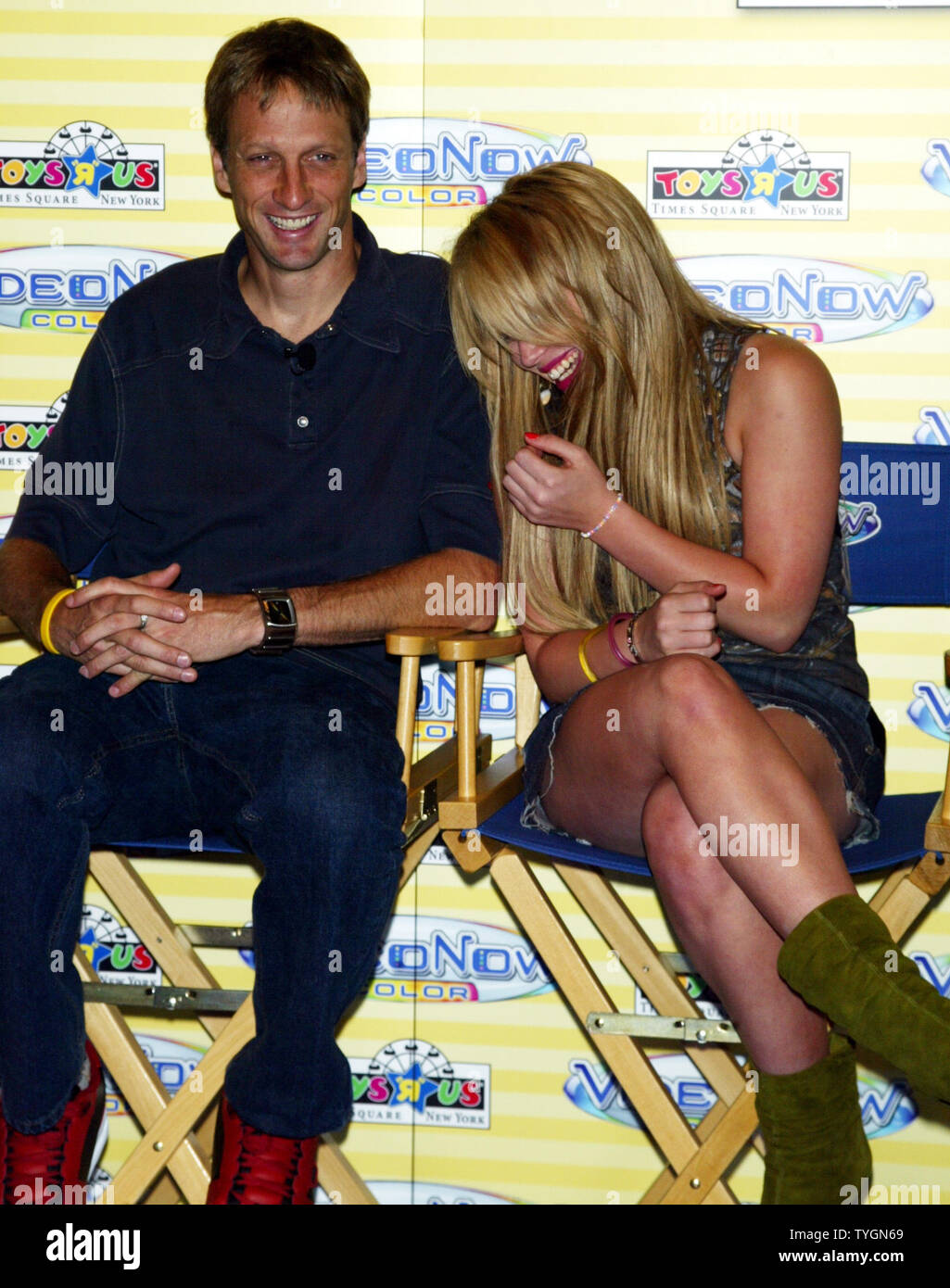 Tony Hawk and Hilary Duff pose for pictures after introducing Hasbro's ...