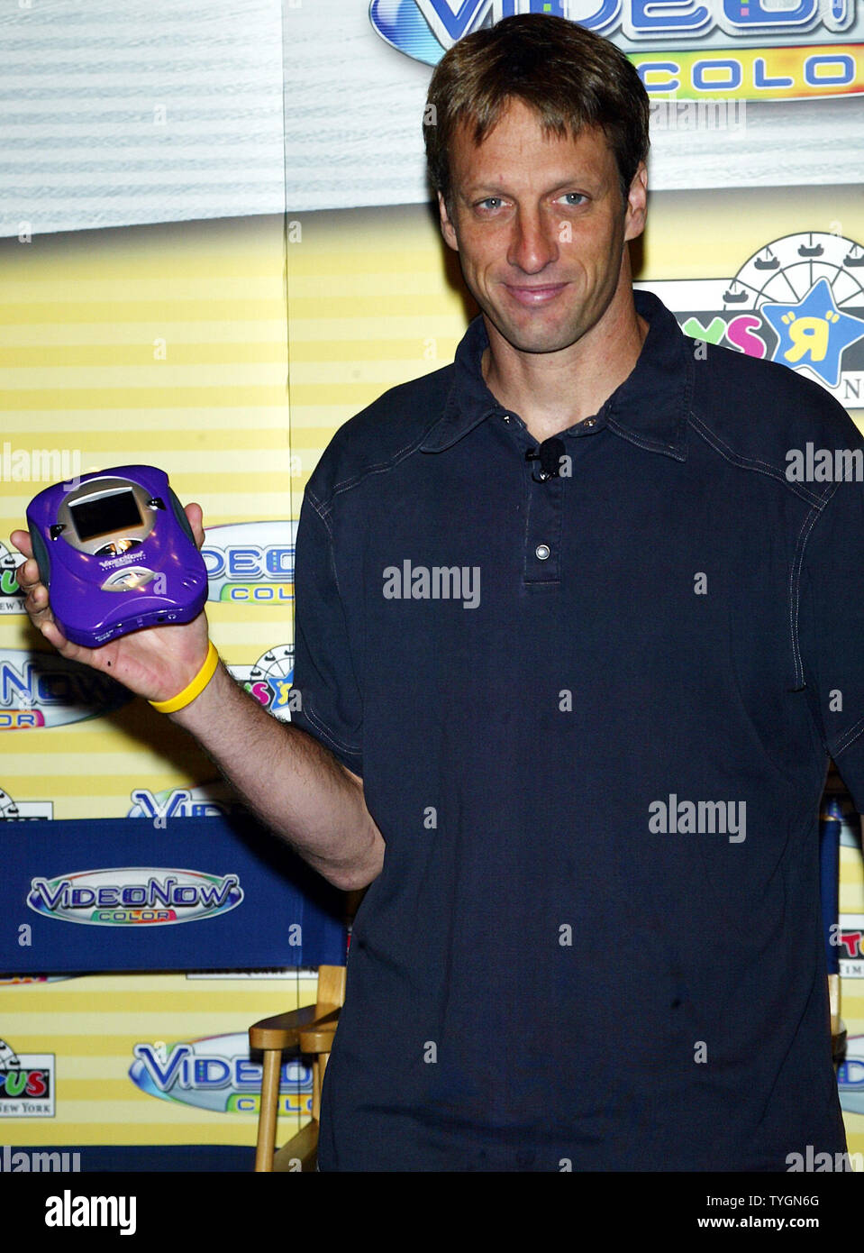 Tony Hawk poses for pictures after introducing Hasbro's Videonow Color ...
