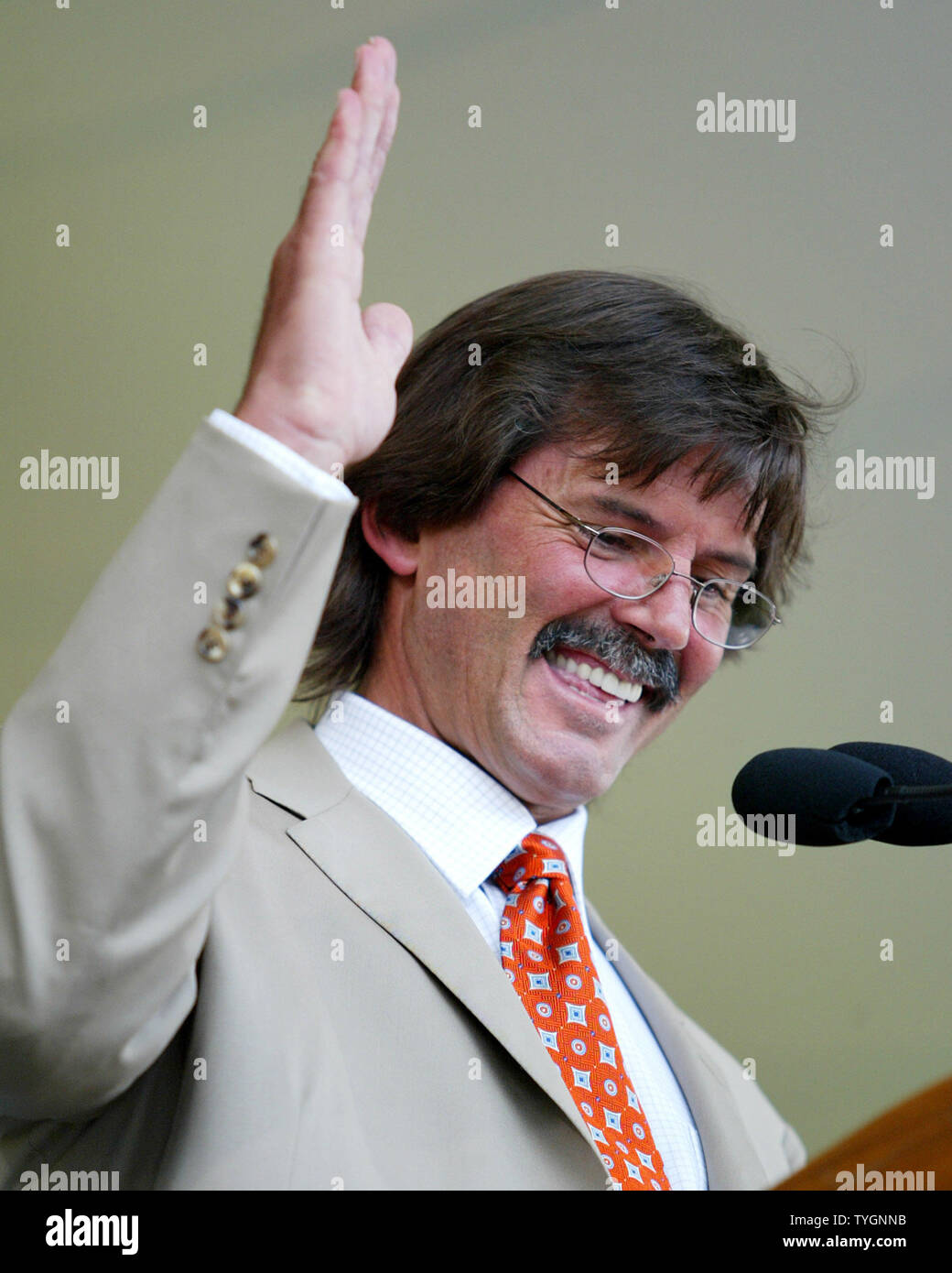 Dennis Eckersley puts his hand up in the air during his Baseball Hall ...