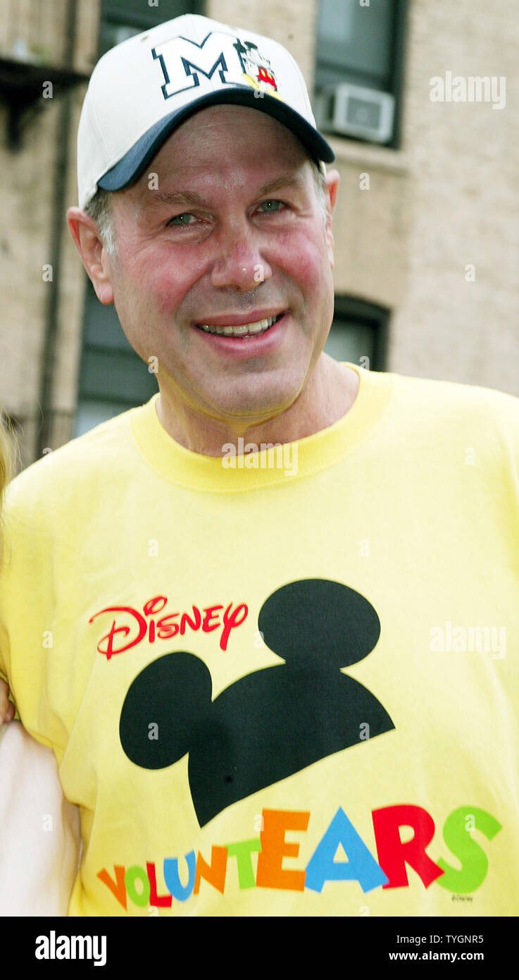 Michael Eisner CEO of Walt Disney Company and Bette Midler, founder of ...