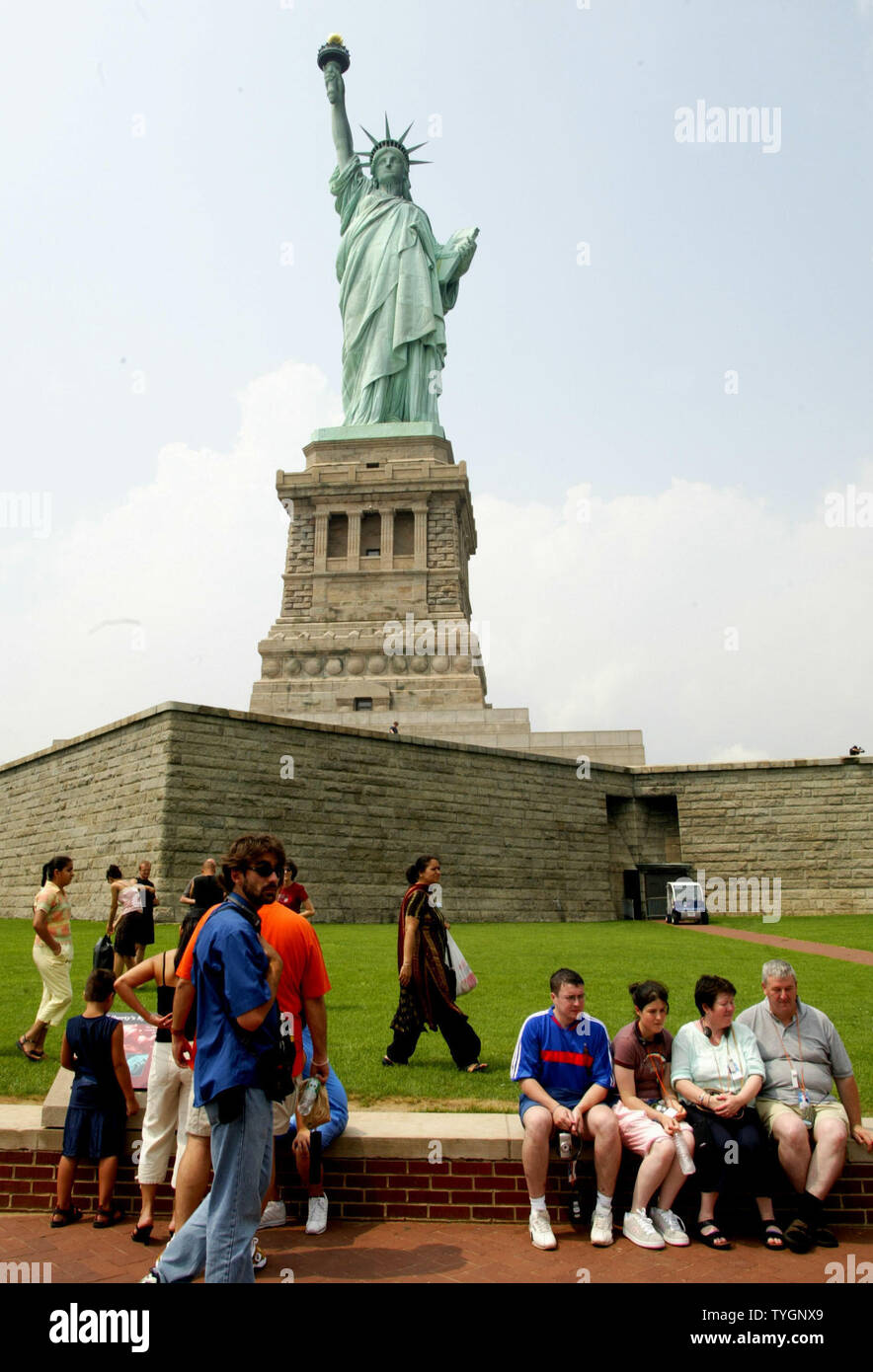 Tourists visit Liberty Island and the Statue of Liberty August 2, 2004 ...